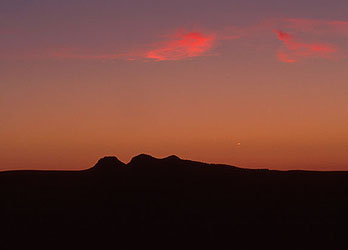 Sunset on Rabbit Ear Mountain, Santa Fe trail landmark near Clayton ...